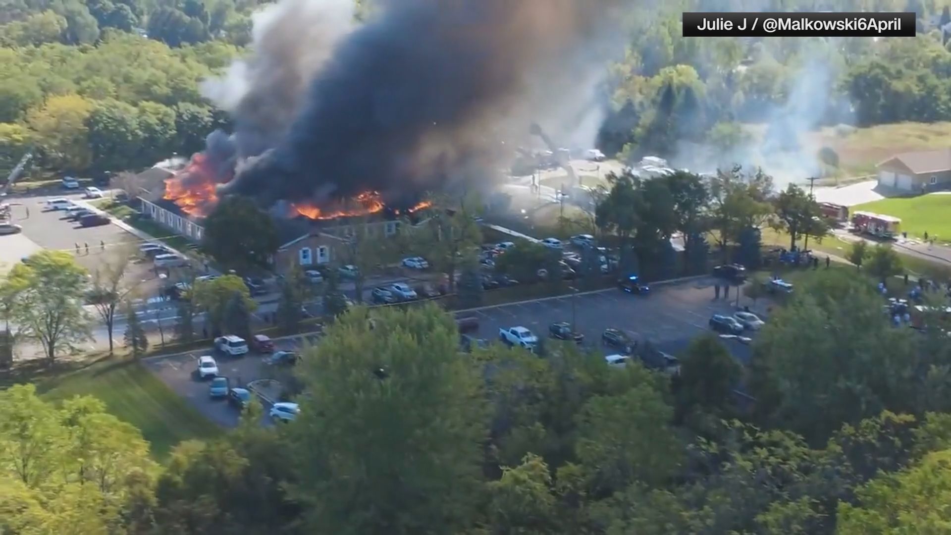 Drone video shows fire at Mormon church after mass shooting in Michigan | wzzm13.com