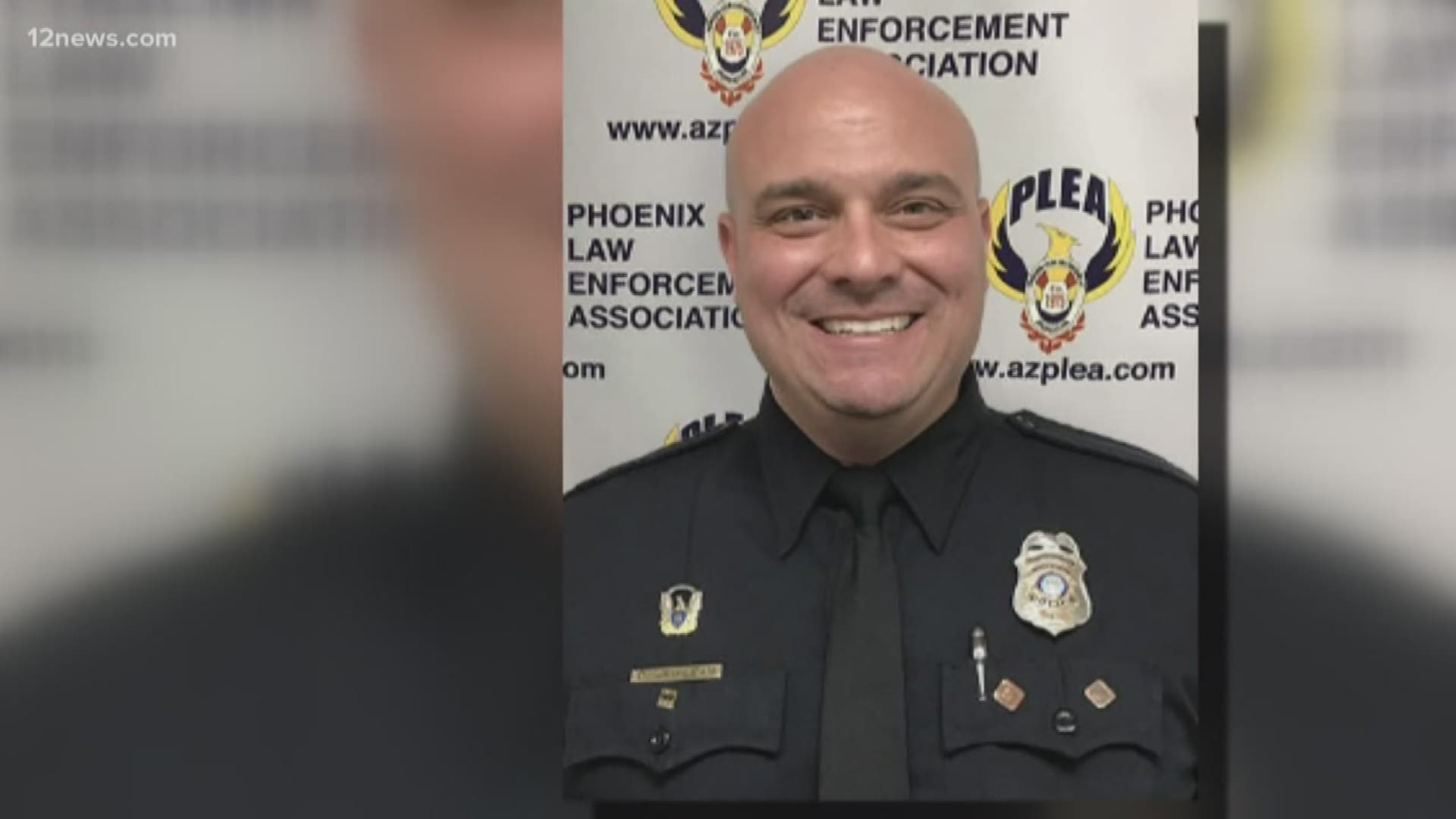 Former Phoenix police officer who punched a suspect in cuffs sentenced ...