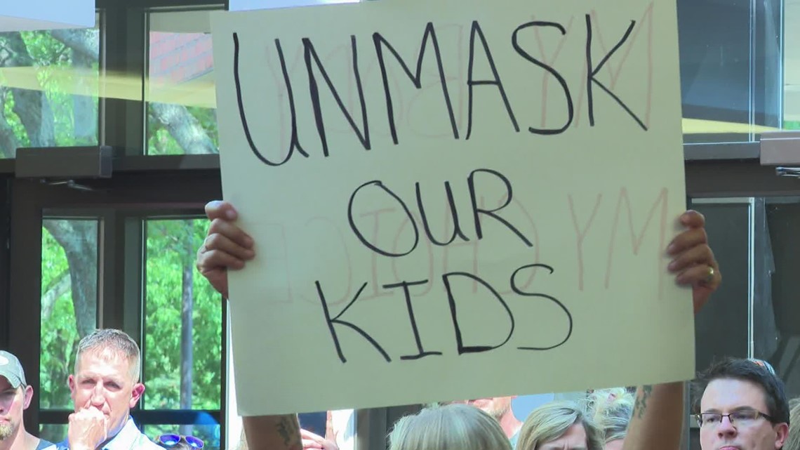Anti-mask protesters overrun Board of Commissioners meeting | wzzm13.com