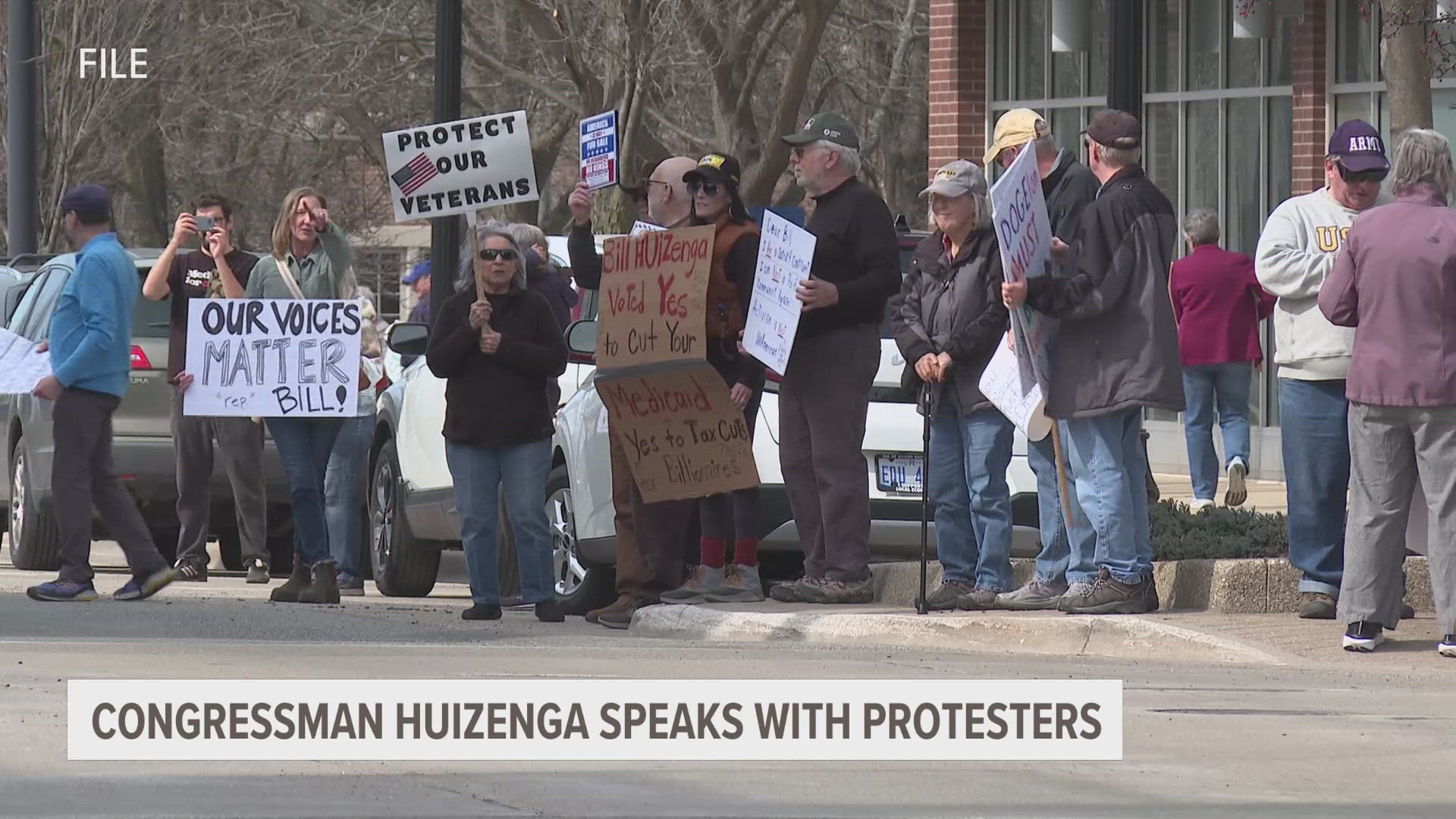 Huizenga engages with protesters outside Michigan office | wzzm13.com