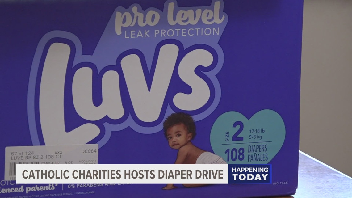Catholic Charities of West Michigan hosts 'Top The Truck' diaper drive in Grand Rapids | wzzm13.com