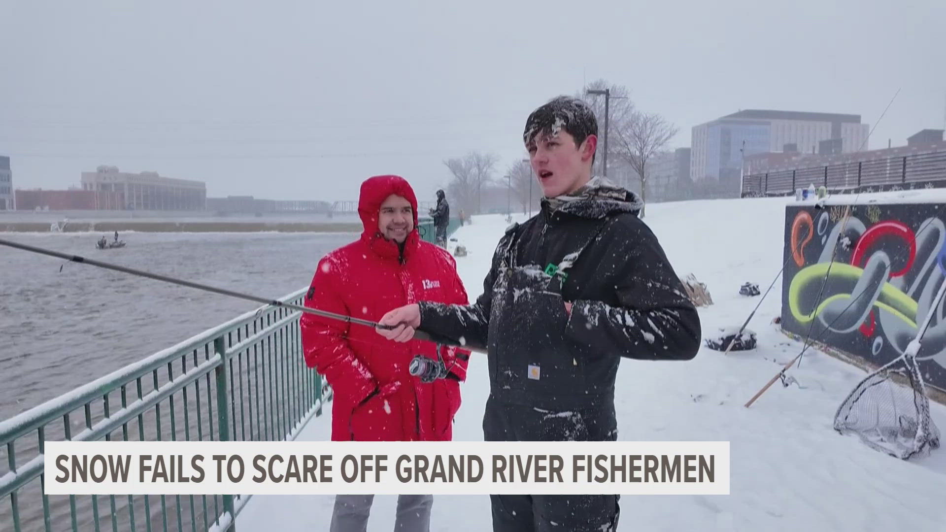 Snow, bitter cold fails to scare off Grand River fishermen | wzzm13.com
