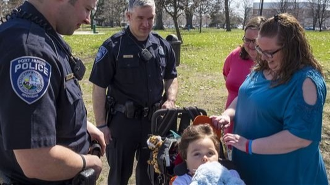 Once-abandoned Port Huron boy meets the cops who saved him | wzzm13.com