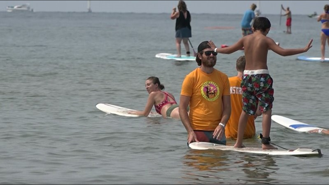 Surfers hit Lake Michigan for the first ever Great Lakes Surf Festival ...