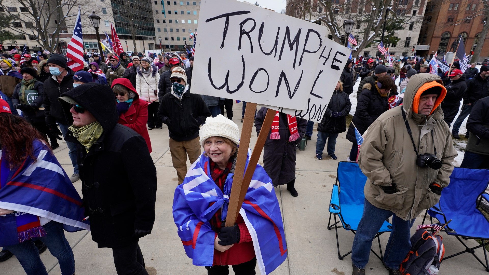 PHOTOS: About 300 Trump supporters gather outside Michigan Capitol ...