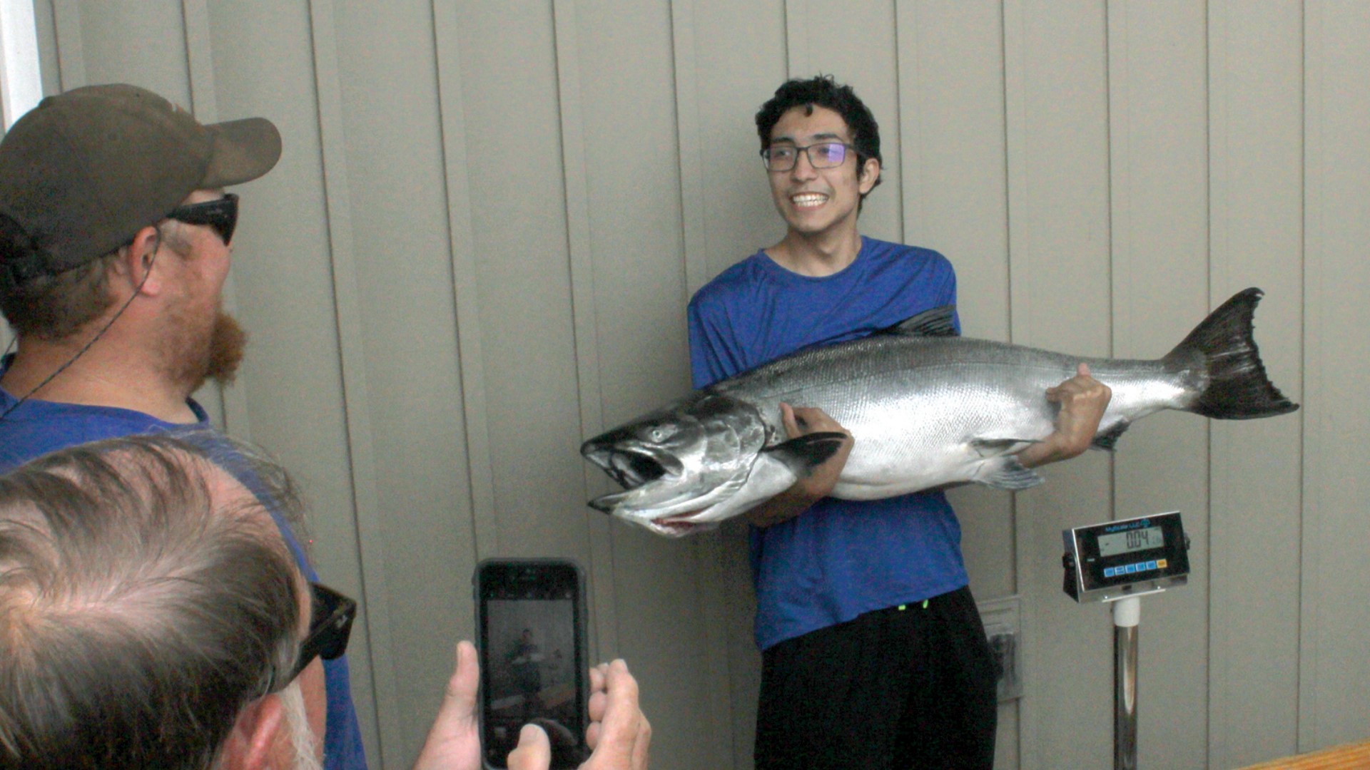 No fish story: Teen sets new Michigan salmon record | wzzm13.com