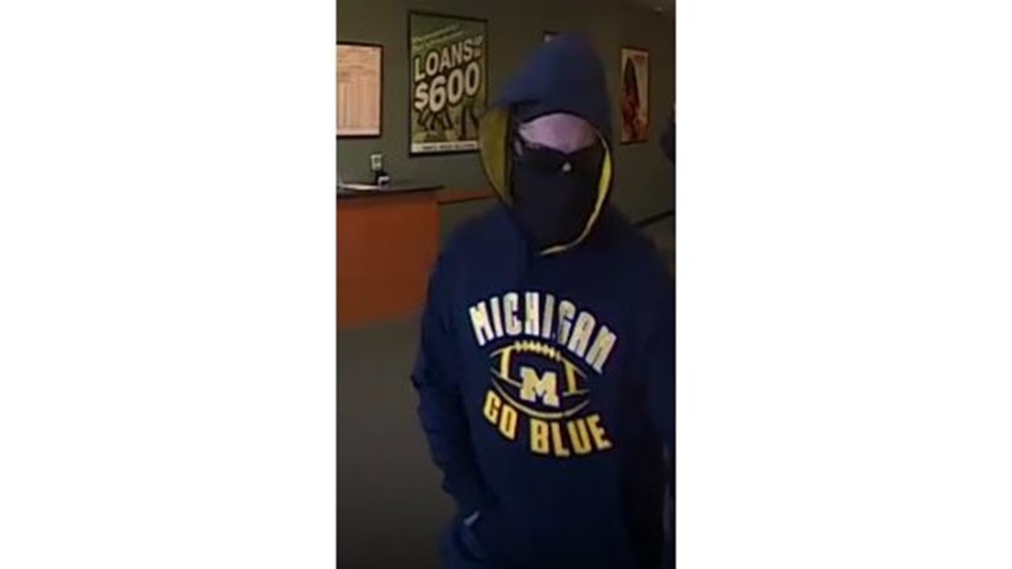 Officers investigating armed robbery at Holland Check 'n Go | wzzm13.com