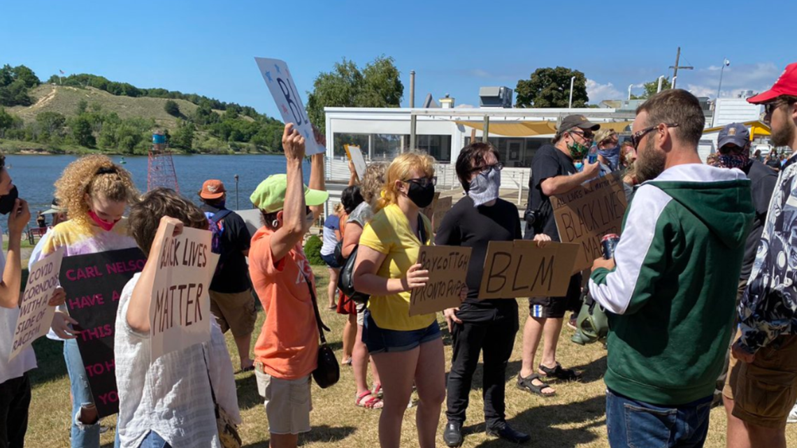 Protest held at Grand Haven Pronto Pup following owner’s controversial ...