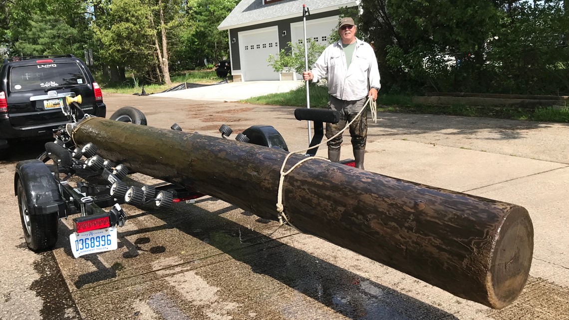 Centuries-old log from Michigan's lumbering era found floating in ...
