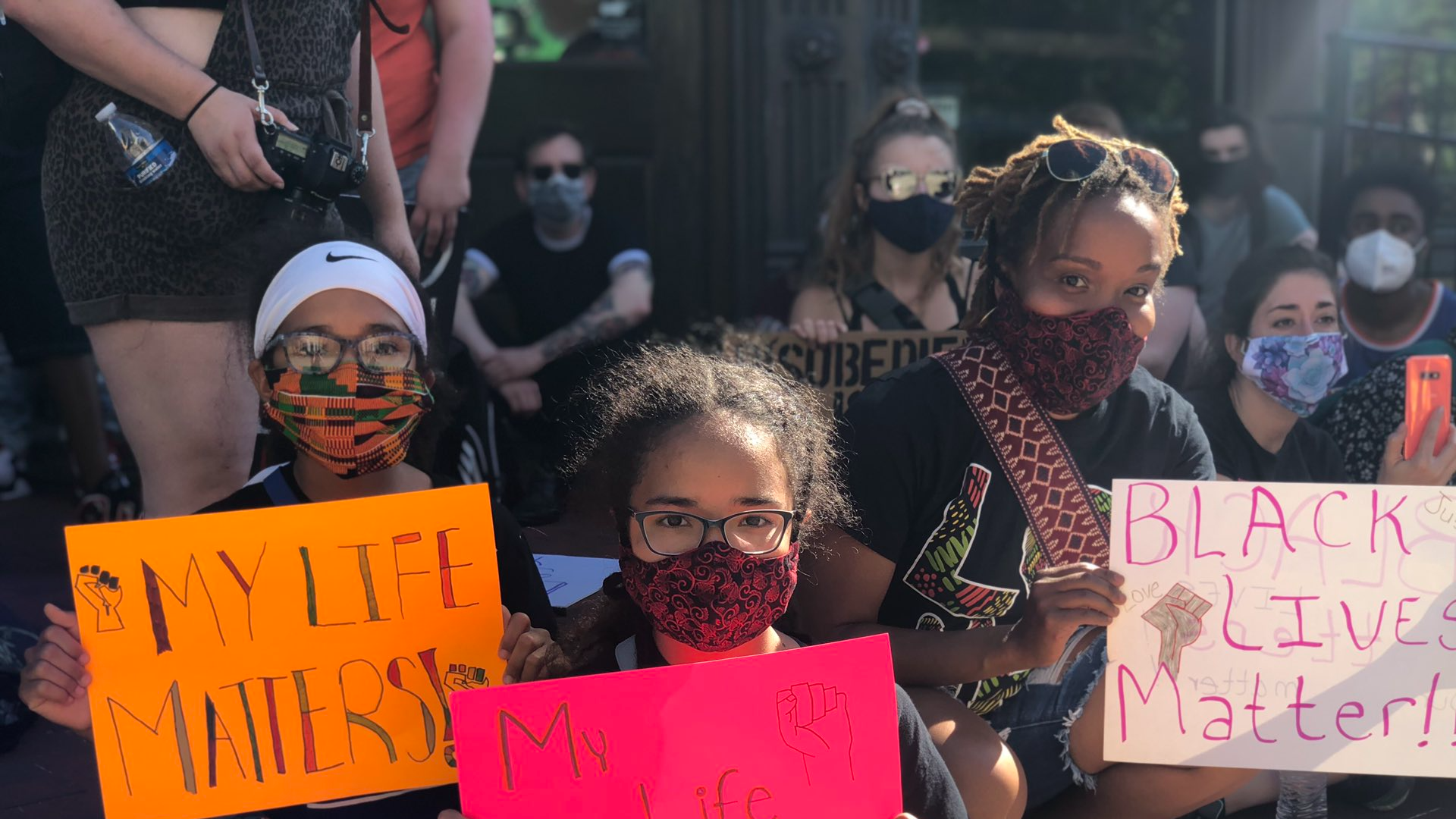 'We are in this together,' Saturday protest centered around community ...