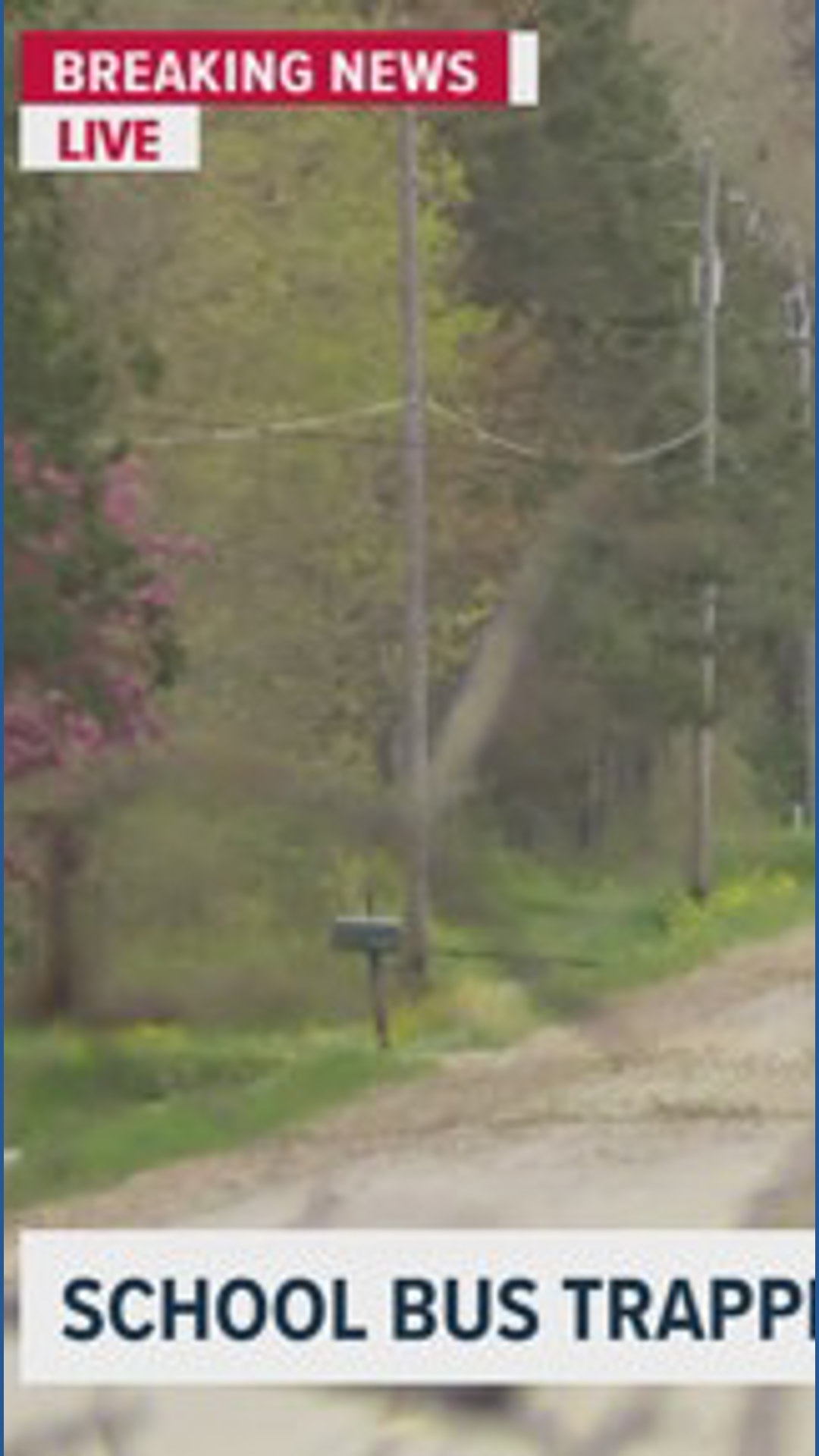 Winds knock down power lines trapping 2 students, driver inside Grand ...