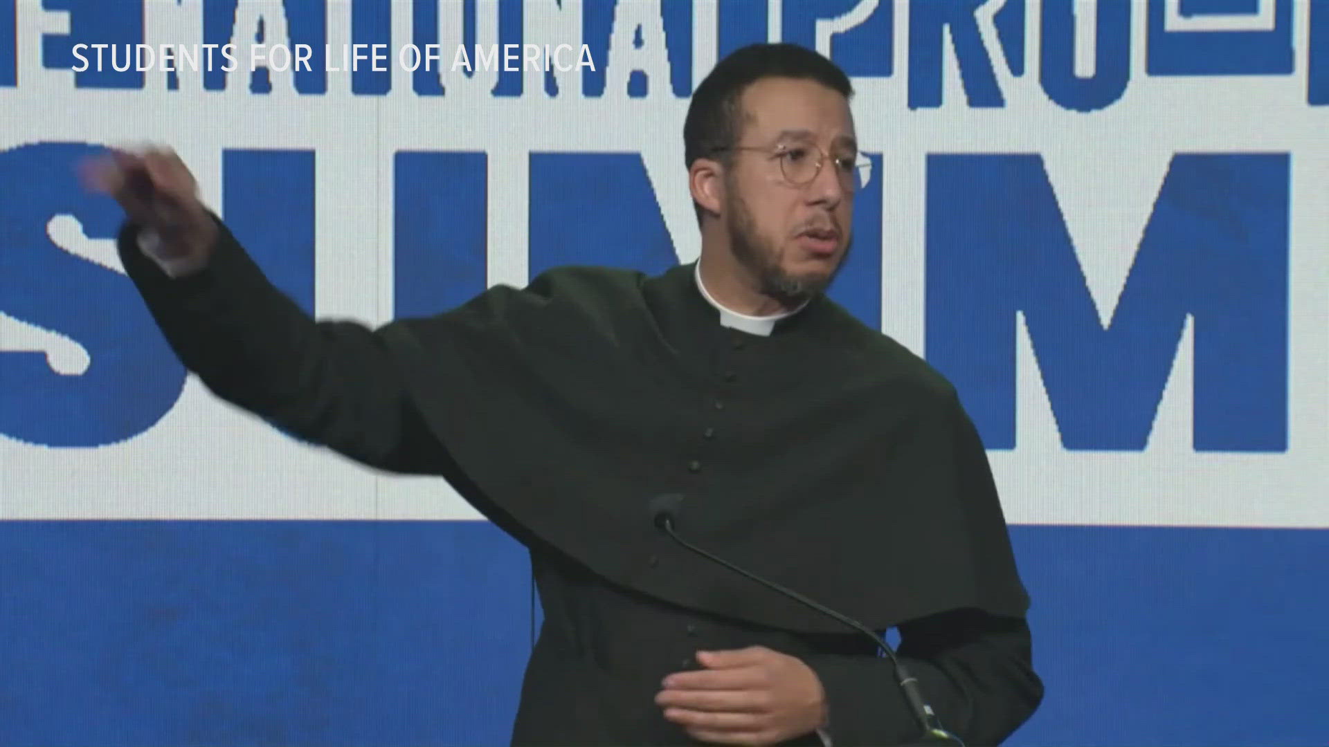 Grand Rapids priest kicked from church after he did Musk's straight-arm ...