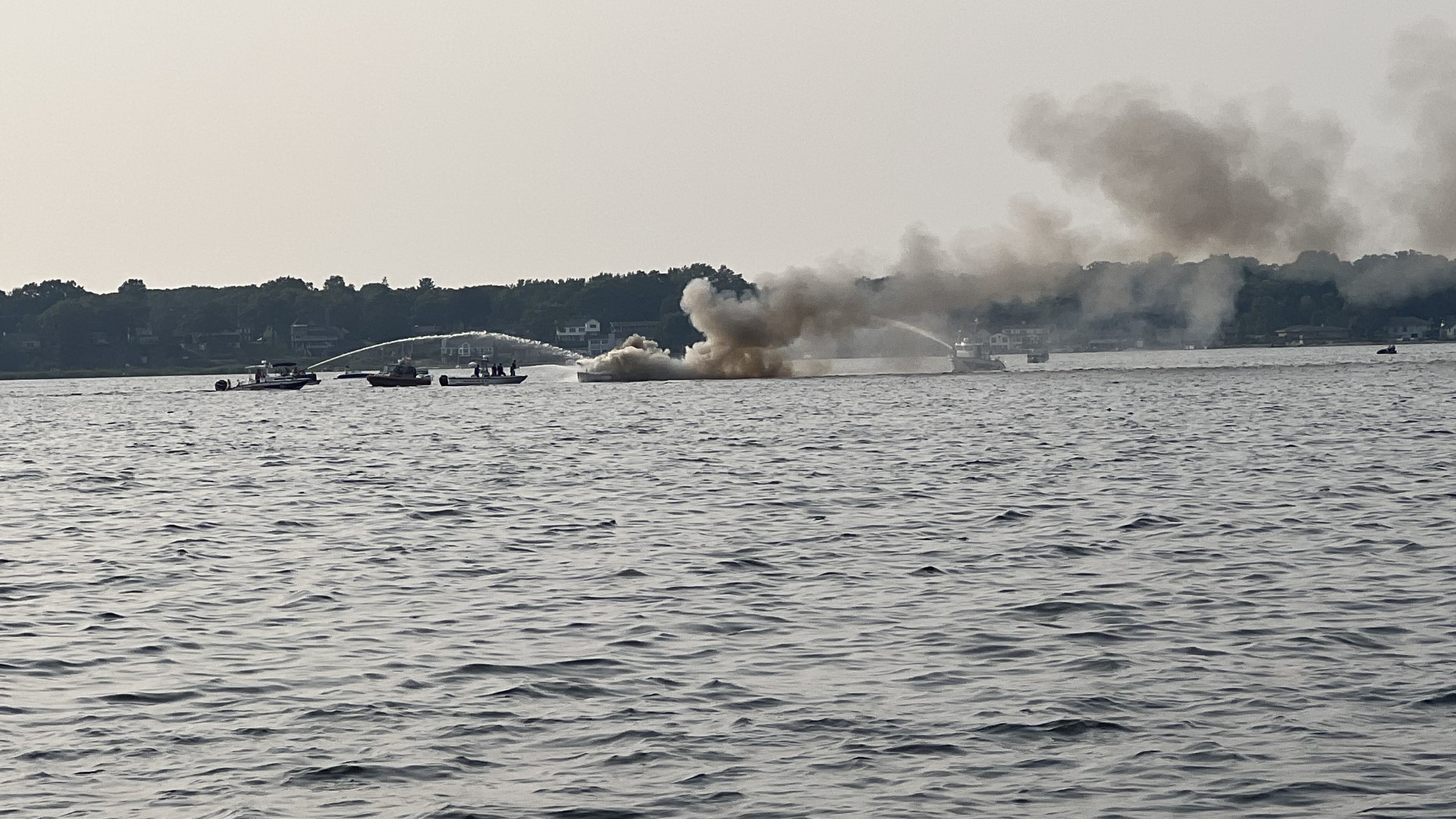 Cleanup efforts underway after boat catches fire on Muskegon Lake ...
