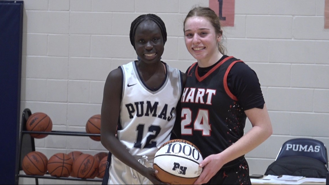 HS basketball opponents become 1,000 point scorers same night | wzzm13.com