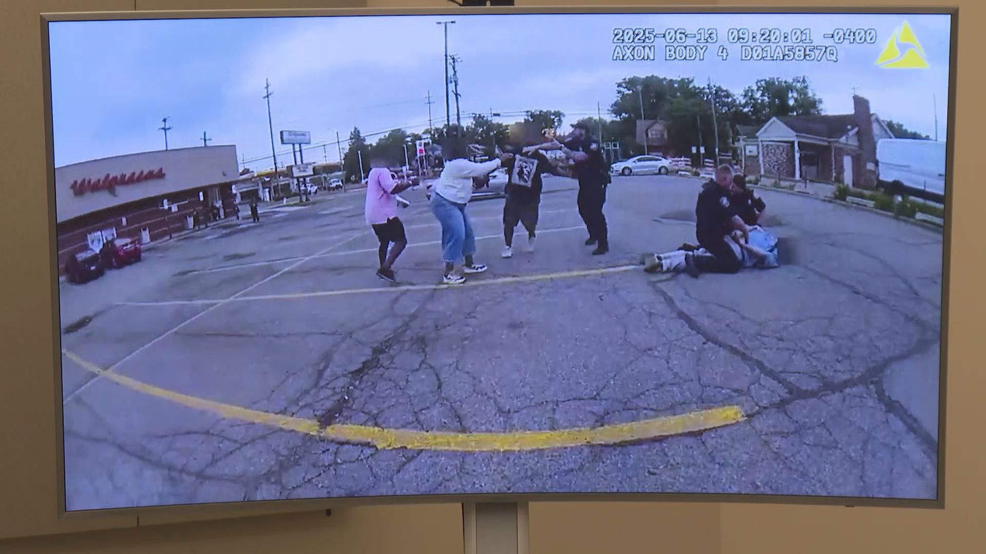 GRPD releases body camera footage from Boston Square arrests | wzzm13.com