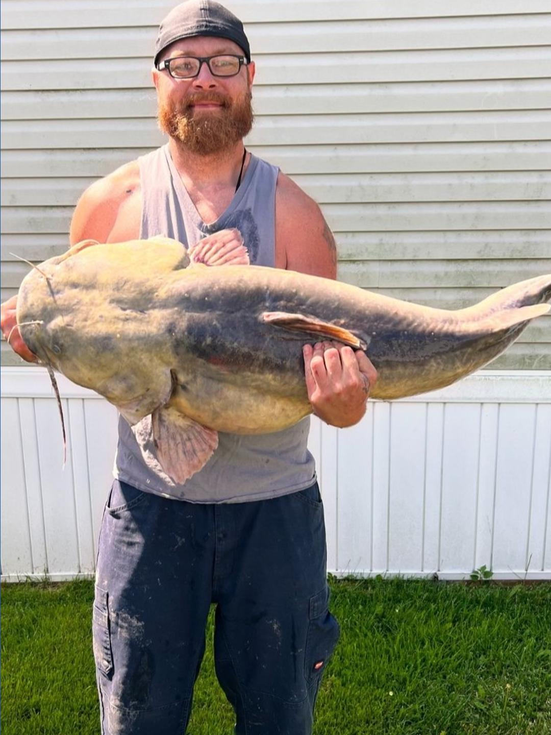 Michigan angler sets new record for largest flathead catfish | wzzm13.com