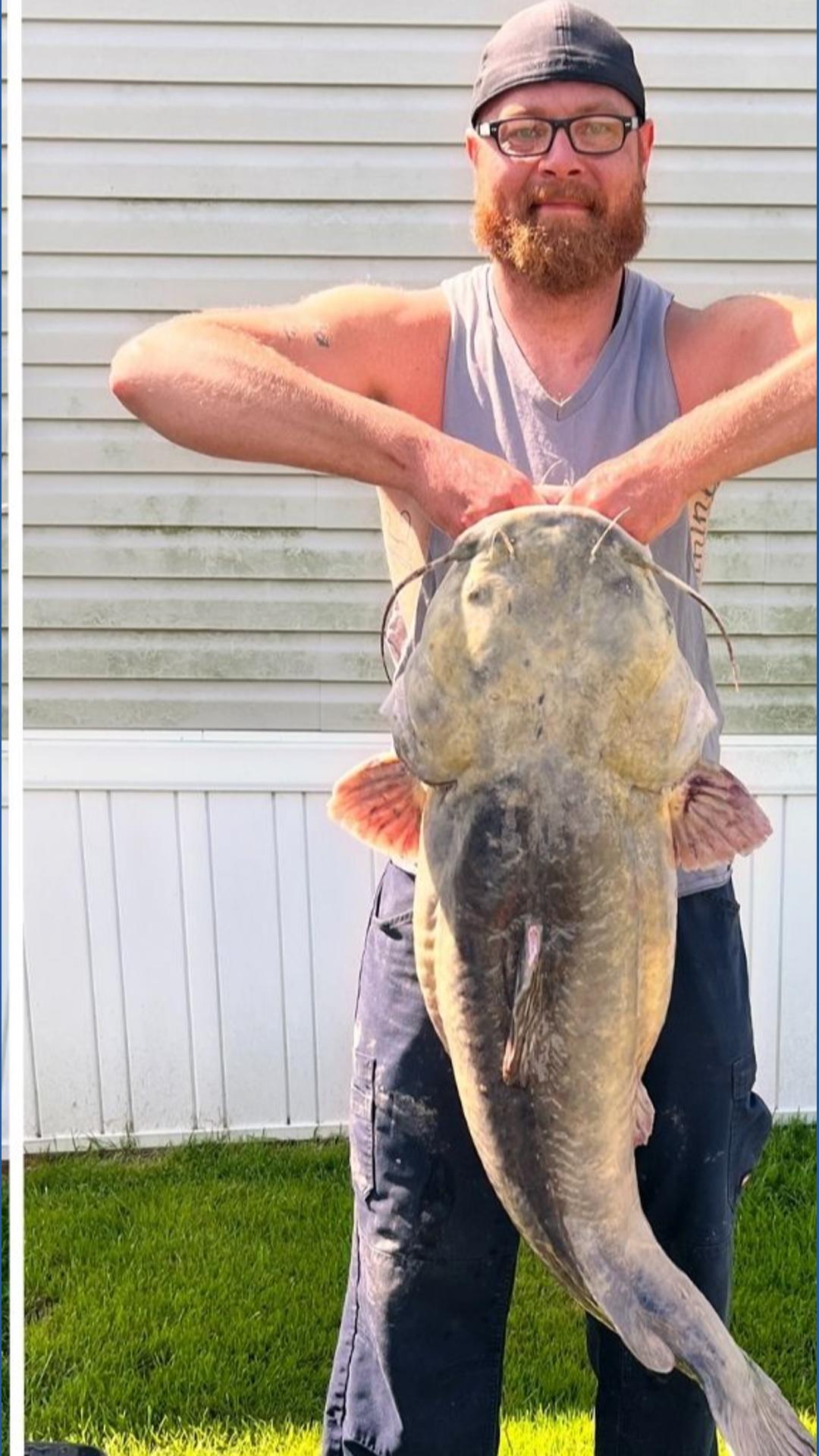 Michigan angler sets new record for largest flathead catfish | wzzm13.com