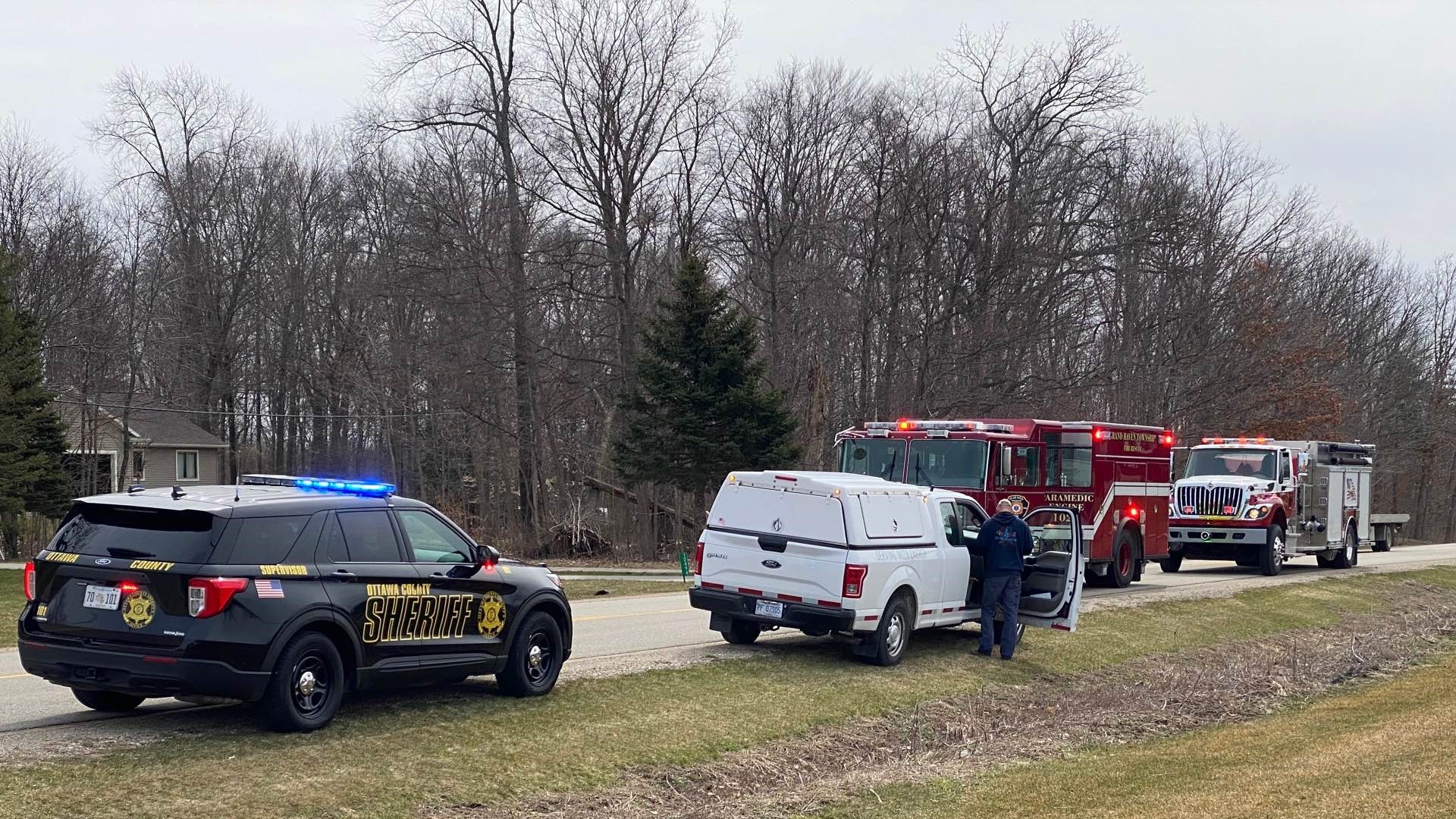 CAUGHT ON CAM: good Samaritans rescue man trapped in pond | wzzm13.com