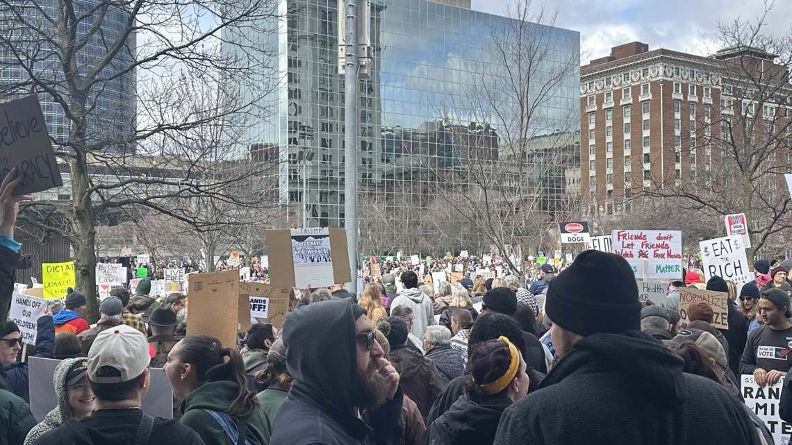 Grand Rapids demonstrators protest Trump and Musk's government cuts ...