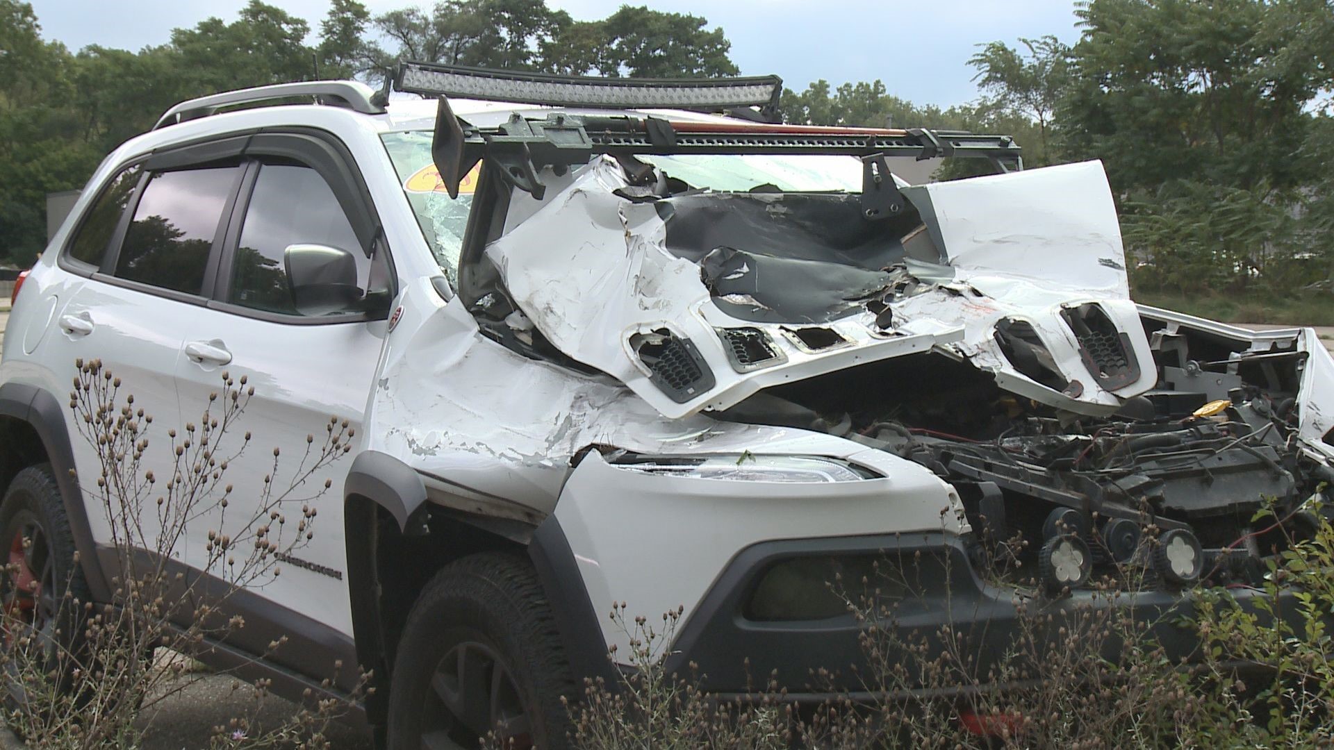 Multiple vehicles damaged in crash at GR used car dealership | wzzm13.com