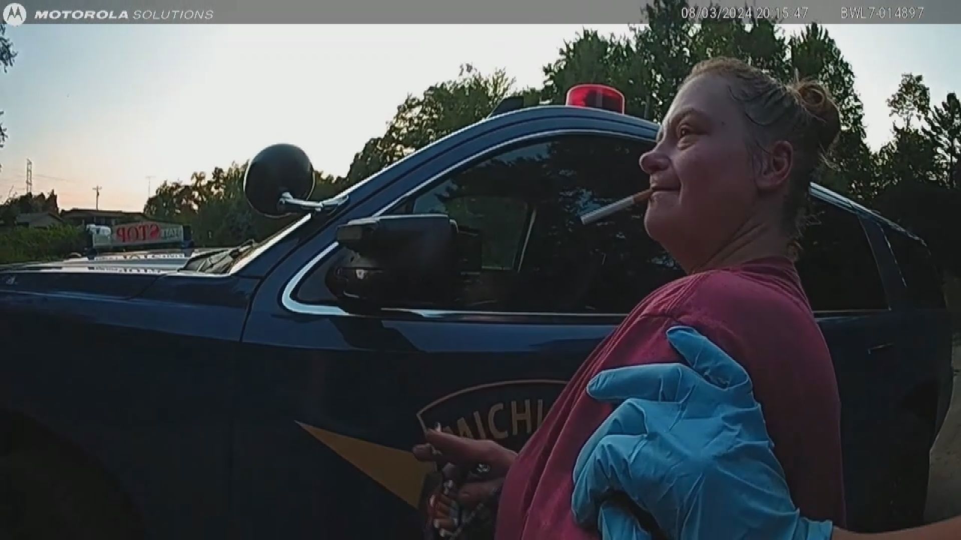 Dash cam shows woman steal patrol vehicle after biting trooper | wzzm13.com