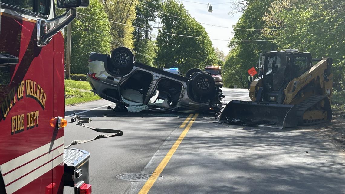 Walker Police: SUV hits skid steer, causing rollover crash | wzzm13.com
