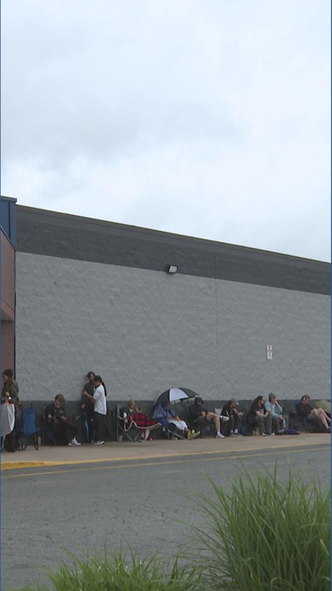 Gamers line up outside Walker GameStop for midnight release of Nintendo ...