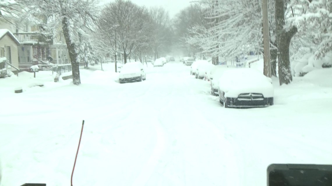 Crews battle bitter cold, winds and snowfall as they clean roads ...