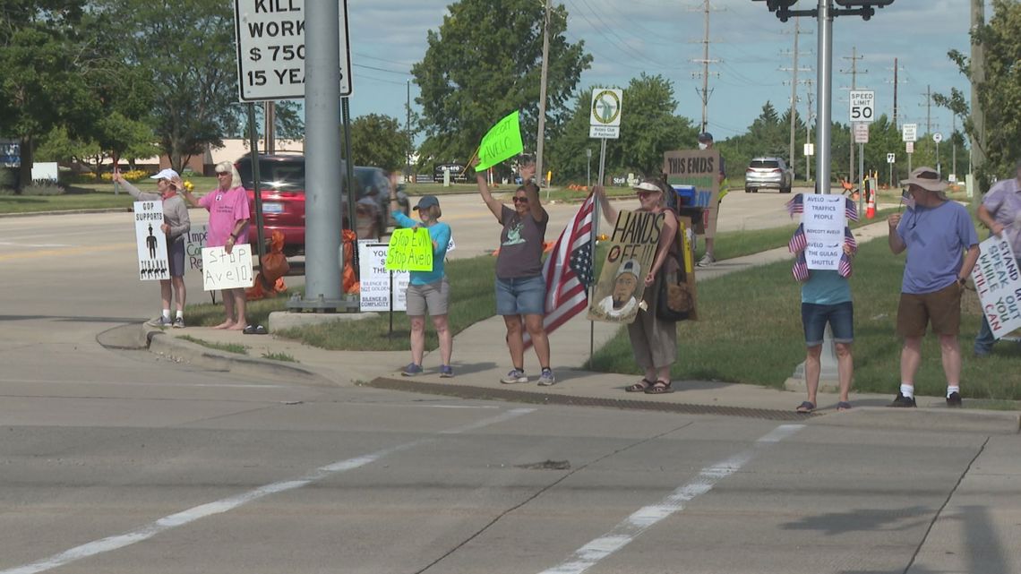 Protestors gather outside of GRR to urge airport to end ties with Avelo ...