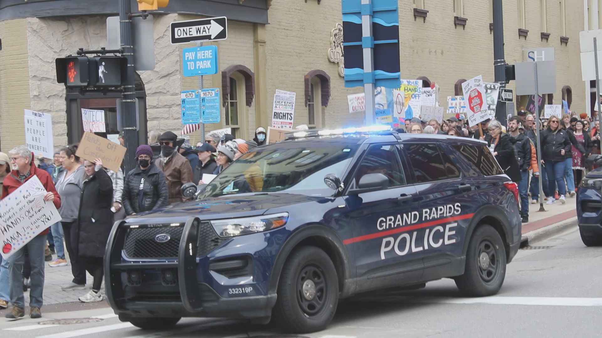 Grand Rapids demonstrators protest Trump and Musk's government cuts ...
