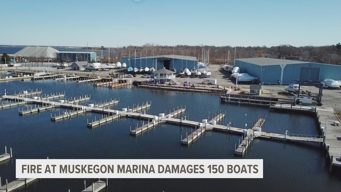 Drone video shows damage to roof after Muskegon marina fire | wzzm13.com