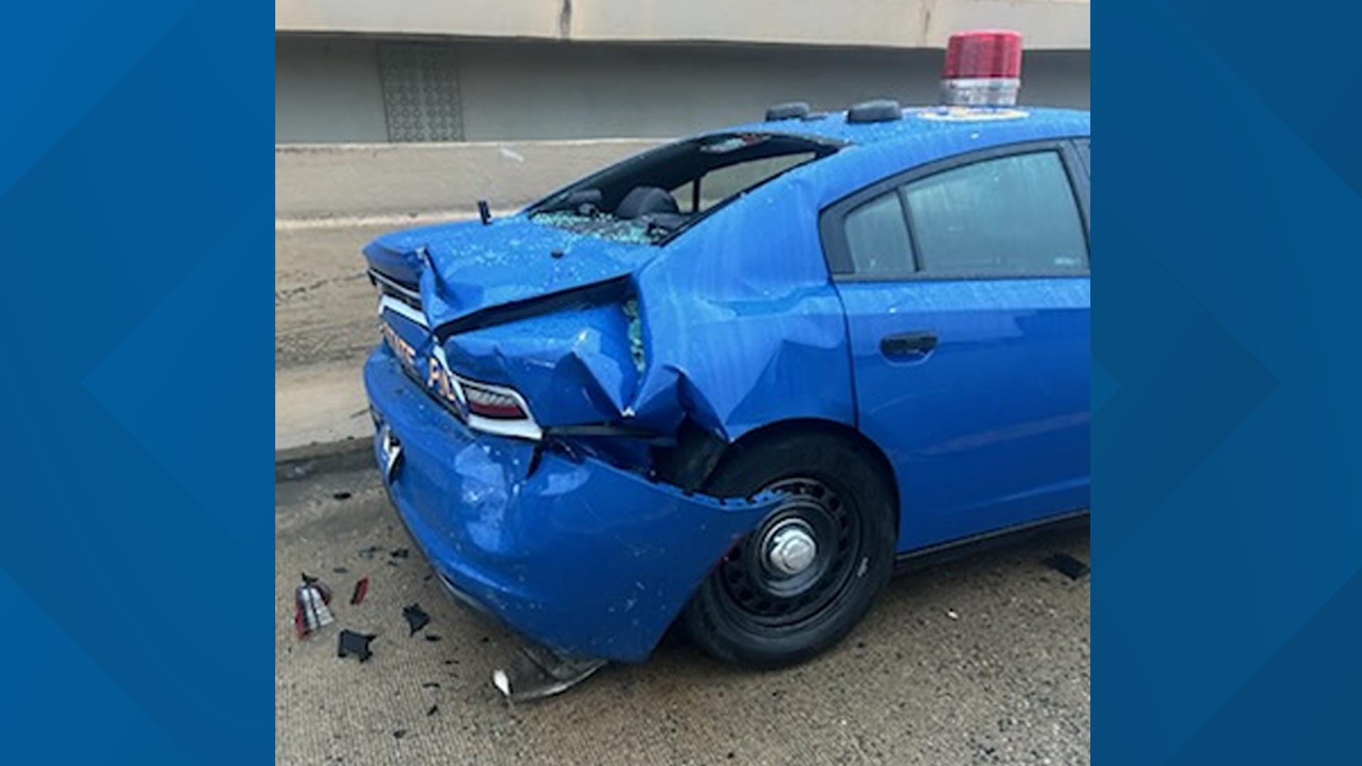 MSP cruiser hit after minivan loses control in Grand Rapids | wzzm13.com