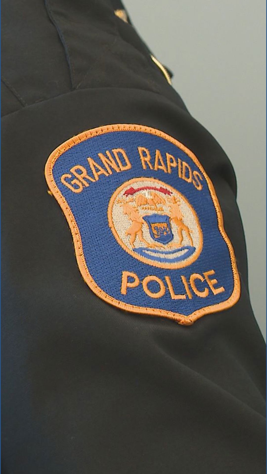 Grand Rapids police defend arrest of two activists near ICE office ...
