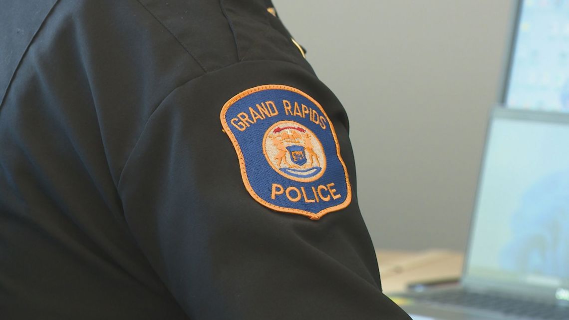 Grand Rapids police defend arrest of two activists near ICE office ...