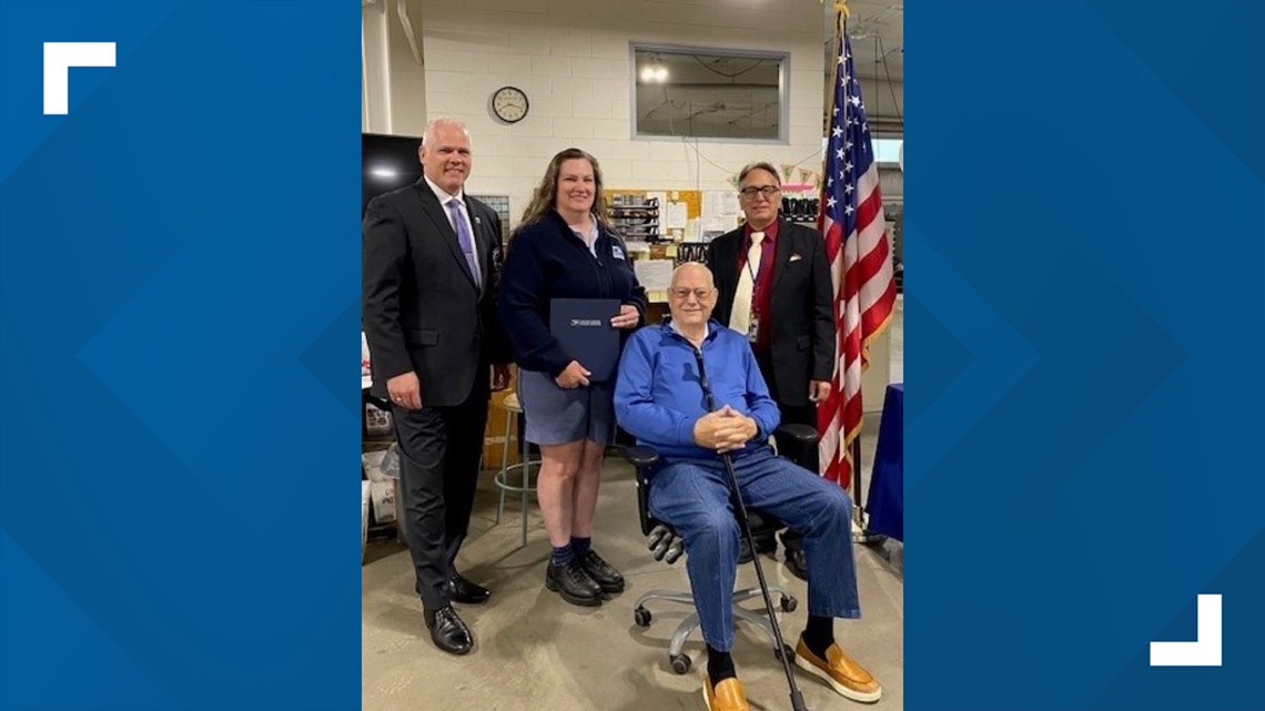 Grand Rapids USPS employee honored for saving a man's life | wzzm13.com
