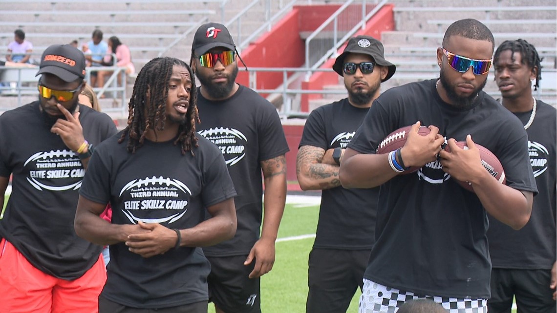 Muskegon football legends give back with football camp | wzzm13.com