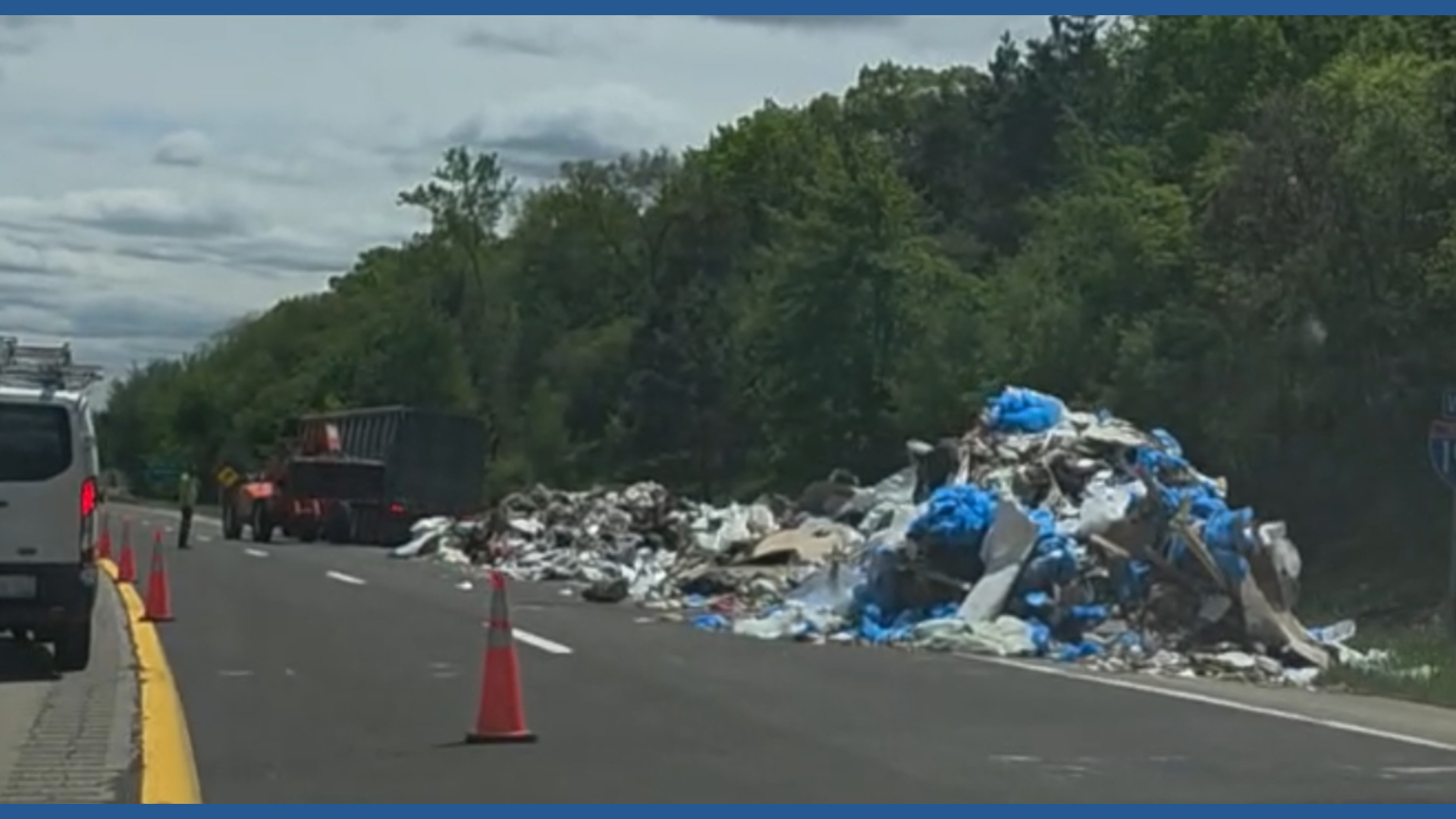 Semi truck dumps load on I-196 after Lake Michigan Drive exit, snarling ...