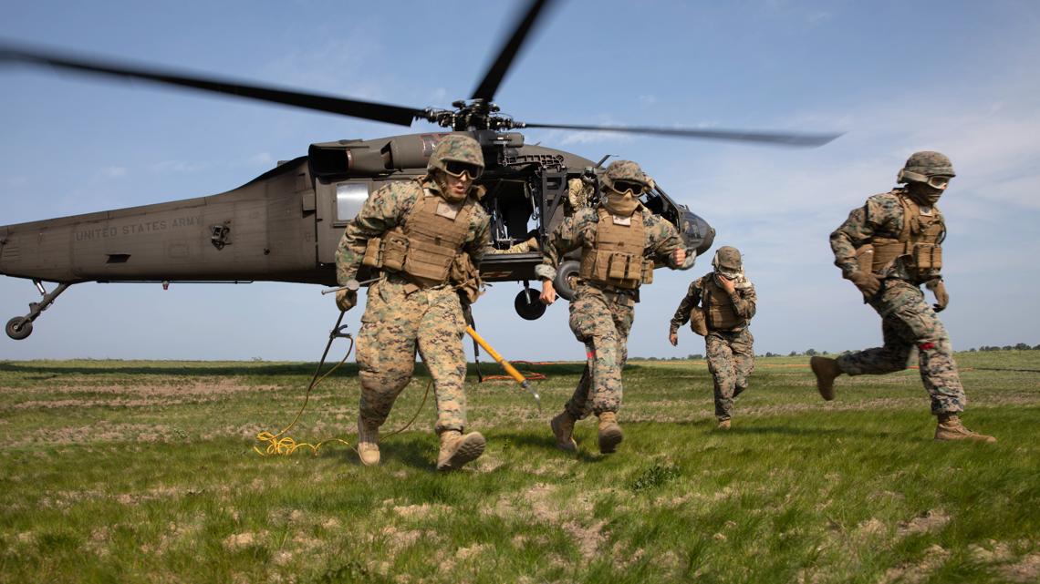 UM students from China charged with visit to military site | wzzm13.com