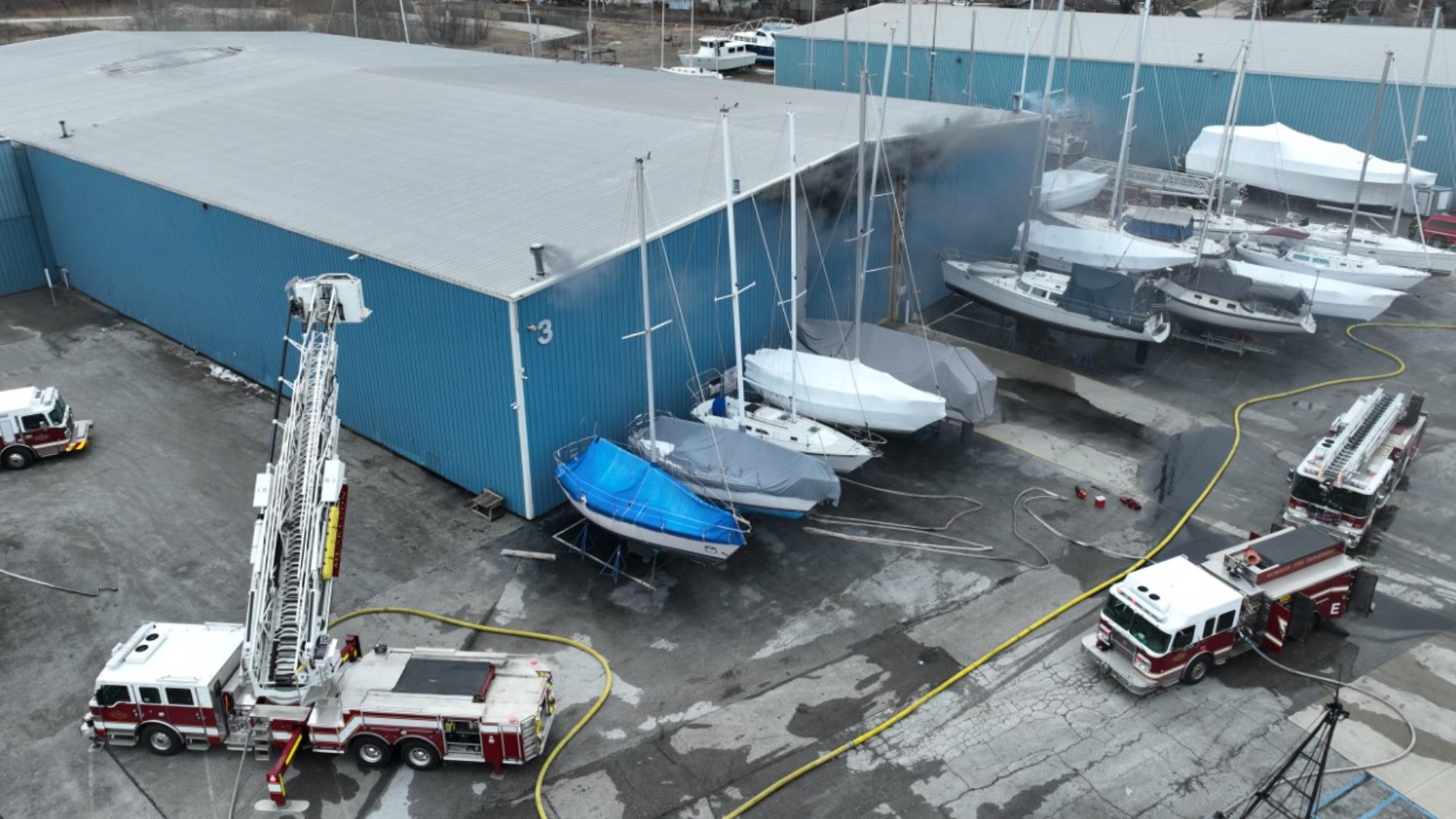 Fire damages boats stored at Safe Harbor Great Lakes Marina | wzzm13.com