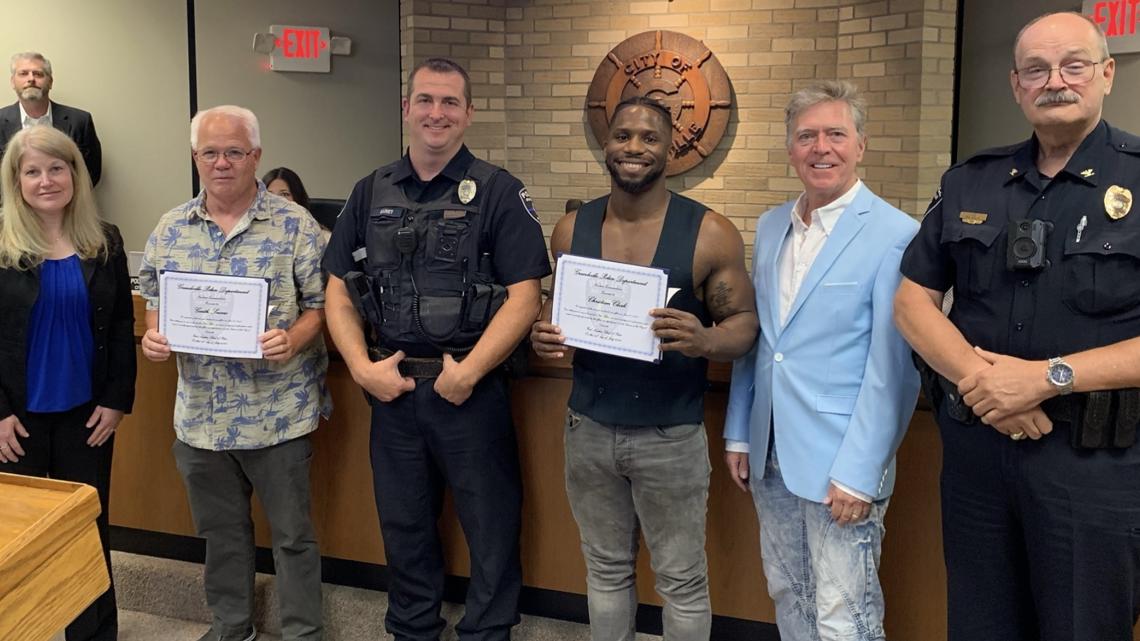 2 civilians honored for assisting Grandville Police Officer | wzzm13.com