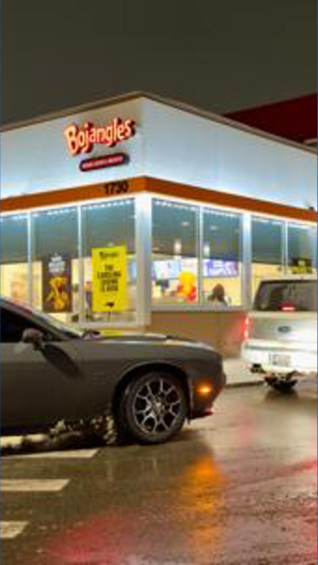 Hundreds line up for first taste of iconic Bojangles menu | wzzm13.com