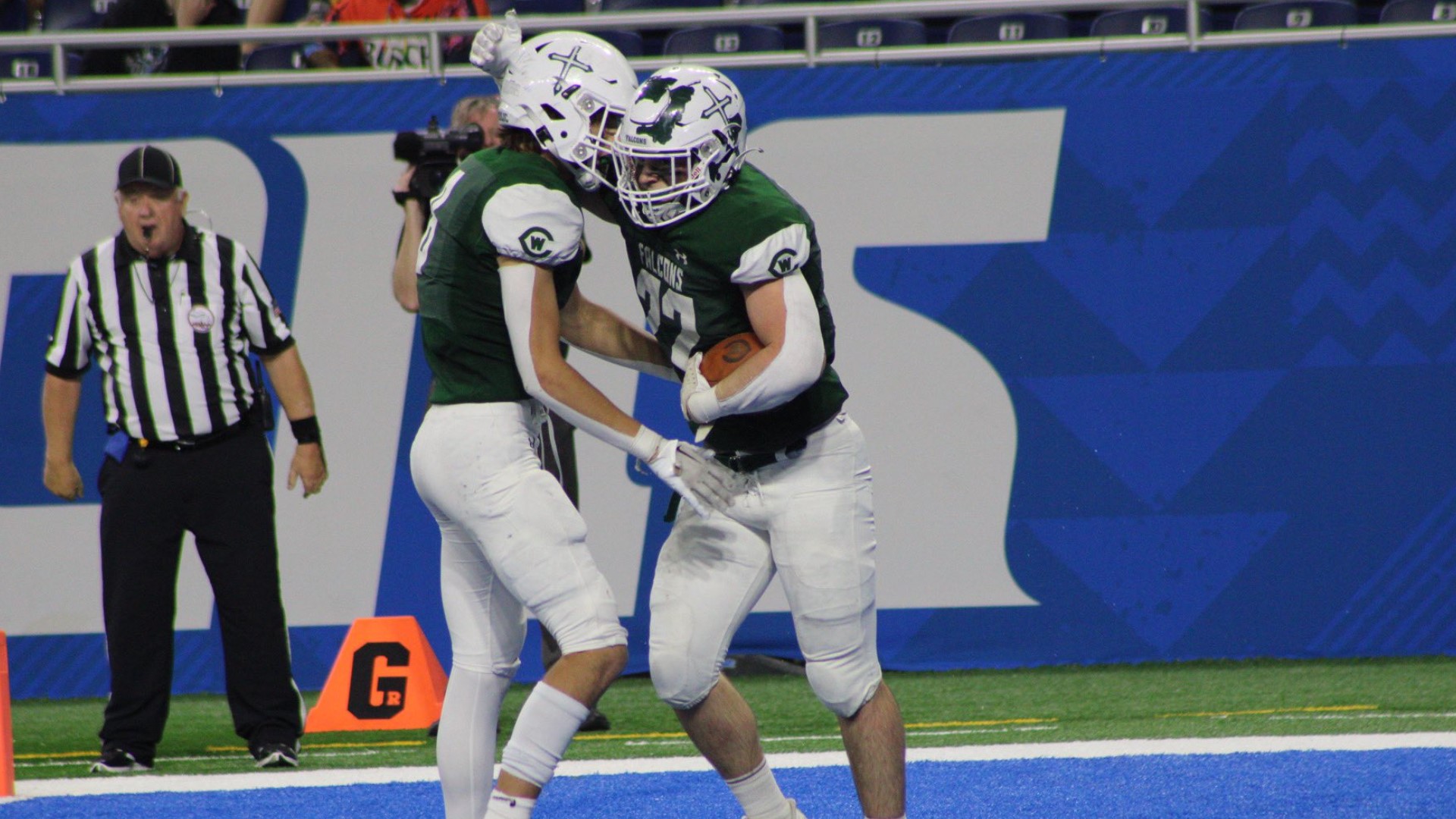 West Catholic wins state football title over Negaunee, 59-14 | wzzm13.com