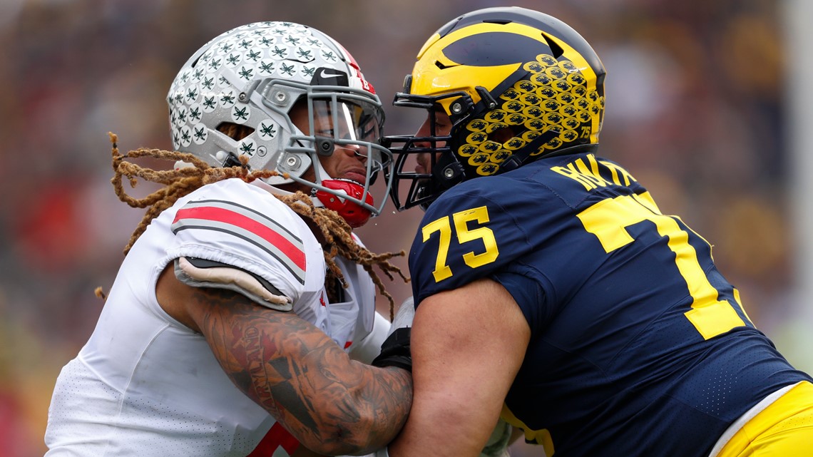 Ohio State beats Michigan 56-27 for record run | wzzm13.com