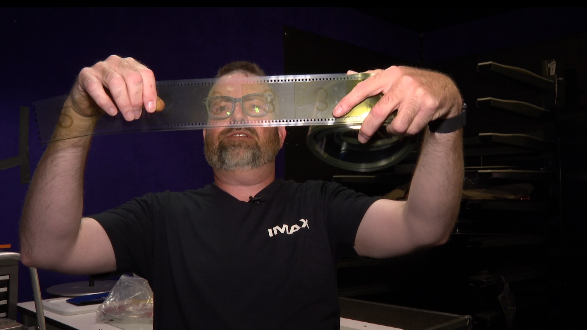 11 mile long 'Oppenheimer' film reel arrives in Grand Rapids | wzzm13.com