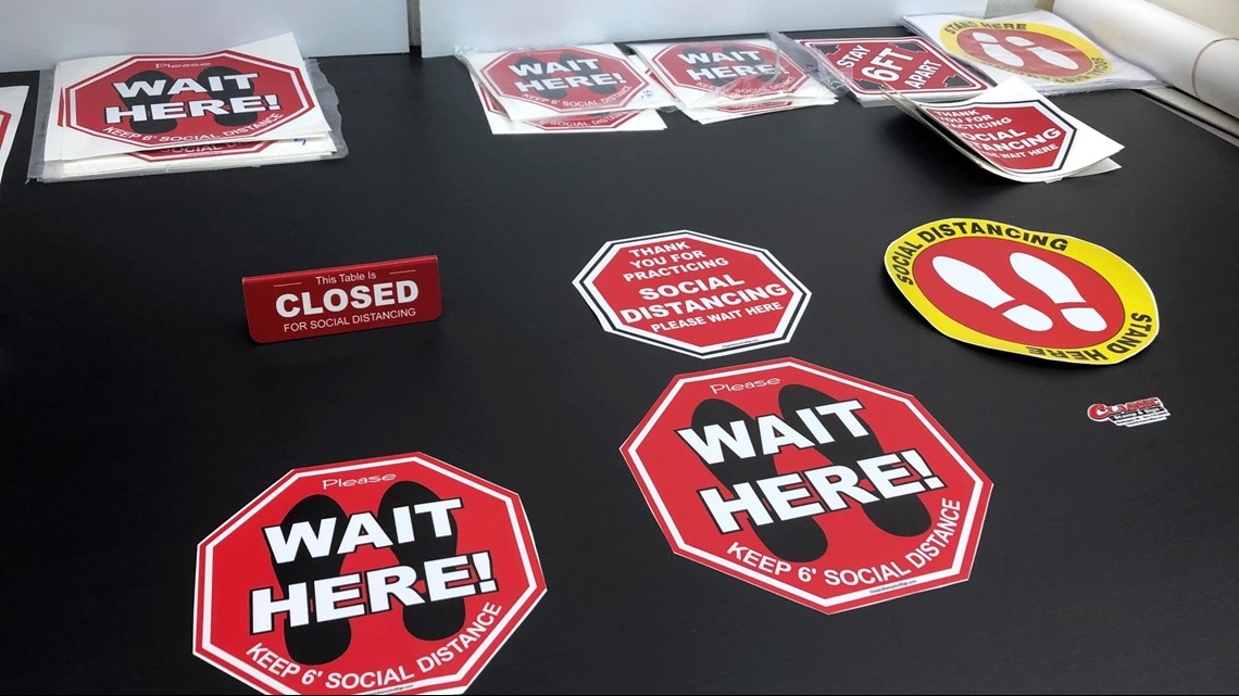 Michigan company makes social distancing signage for businesses, as ...
