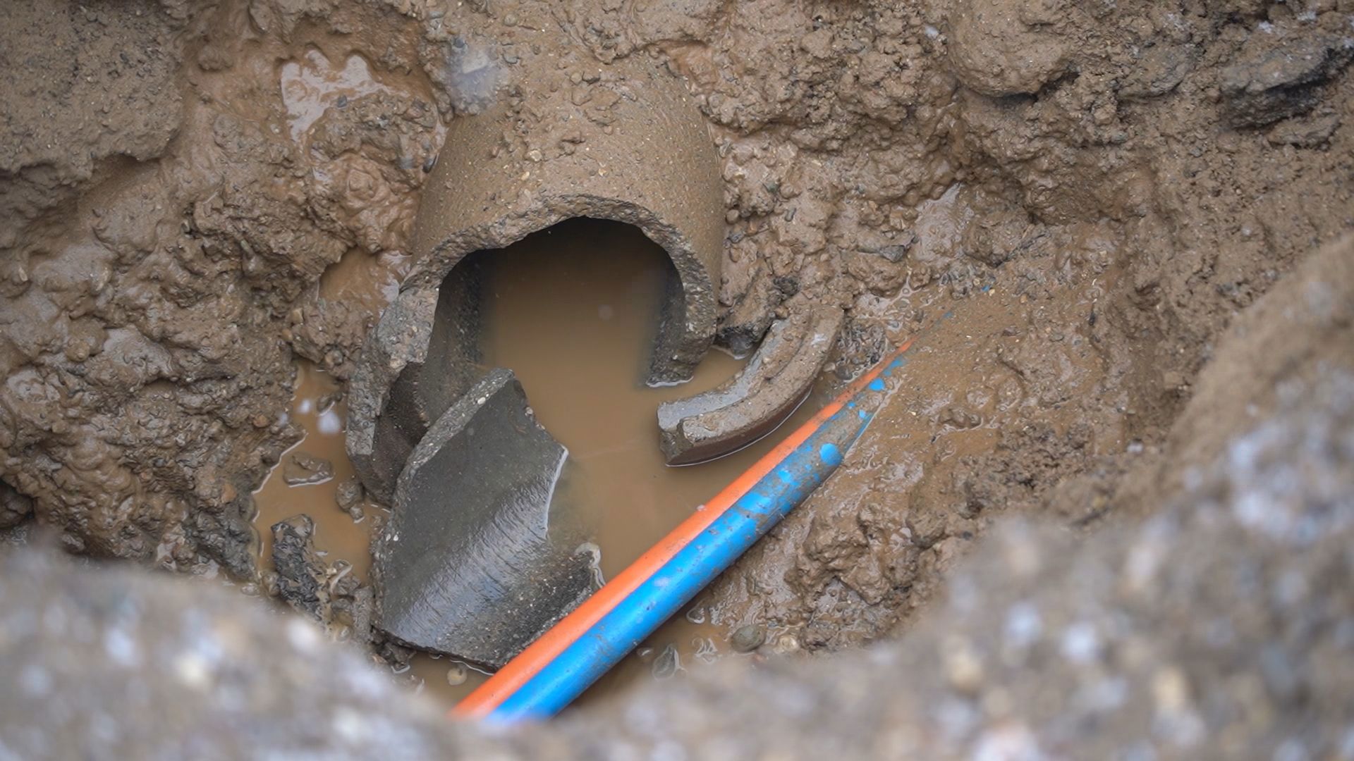 Sinkhole opens in Walker intersection overnight; crews working on temporary fix | wzzm13.com