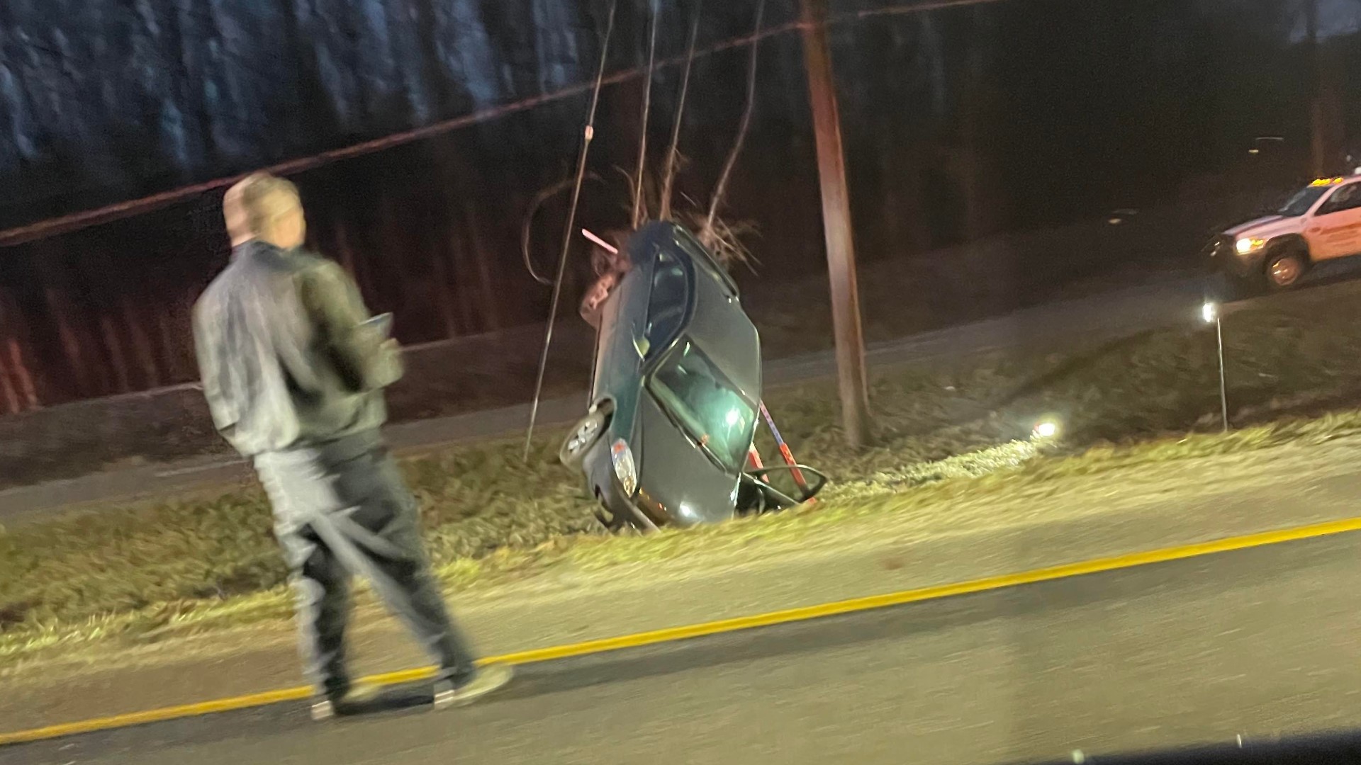 Car suspended in wires in crash | wzzm13.com